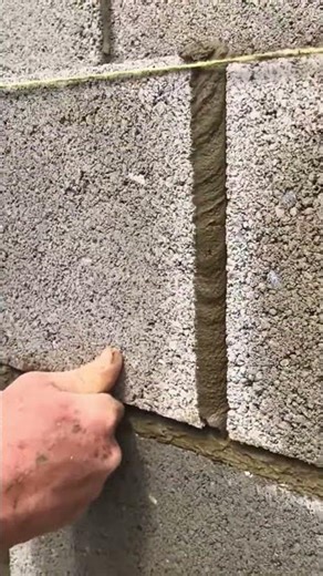 Installing a large concrete block carefully ensures stability accuracy and long lasting structure ok