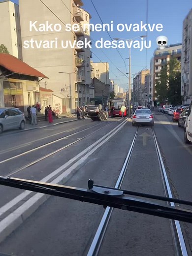Overturned Car on Tram Tracks: Urban Incident Overview