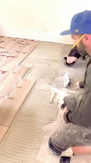 Baby plank tile floor install with my mate. #construction #remodel #tiling #tile | Crownetools