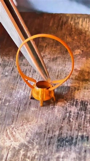 How to attach a gold ring to a bangle