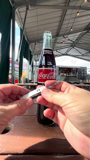 Lifting a cap with the Victorinox Mini Champ Alox. #edc #swissarmyknife