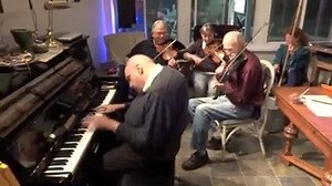 Here again is the awesome Ed Clute sightless stride pianist. This time again playing brilliantly along with the very talented members of the 'Old-Time Fiddler's' in New York, USA. Ed might not be able to see but he is an absolute maestro on the Piano. Brilliant! Check him out: Ed Clute | The Music Man