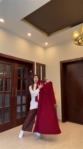 Clothenia on Instagram: "“Your go-to maroon mood 💃💄” “Because elegance never goes out of style 💫” Wine whisper Dress 🍷 [ skirt and top, maxi dress, long frock, party wear, bloggers, viral, insta trend, trending, viral now, engage now, trend, online shopping]"