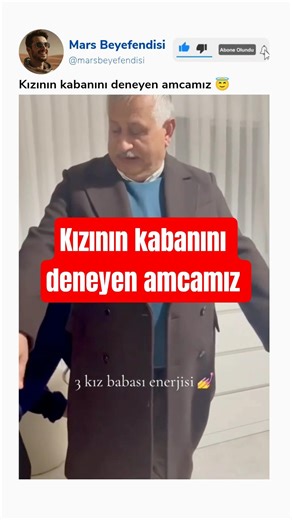 kızının kabanını deneyen amcamız