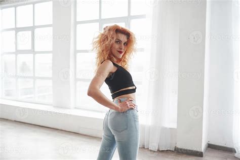Hobby Of Dancing Attractive Redhead Woman Posing In The Spacey Room Near The Window 8681382