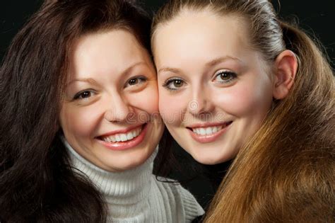 Two Lesbians Sisters Twins Beautiful Curly Blonde Young Woman In Stylish Dress Holding Hands In