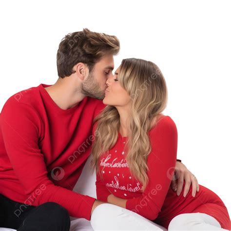 Couple In Red Christmas Jumpers Kissing Surrounded By Pillows Wedding Couple Wife Christmas
