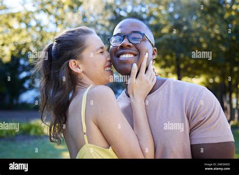 Summer Love And Laugh With An Interracial Couple Bonding Outdoor Together In A Park Or Garden