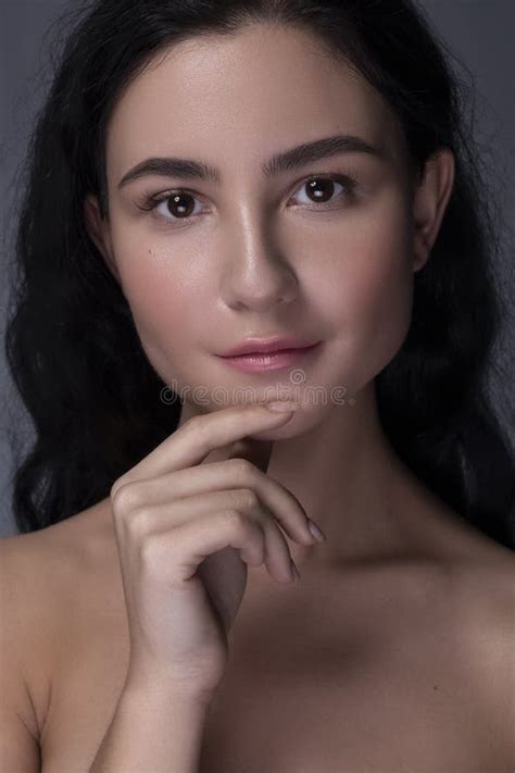 Close Up Portrait Of Brunette Woman With Flawless Clean Skin Creative Make Up With Dark Vine