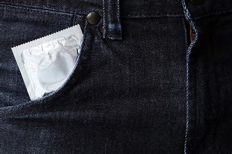 Premium Photo Condom Ready To Use In Pocket Jeans Pants Give Safe