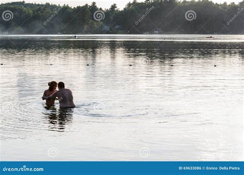Young Couple In The Lake Editorial Photo Image Of Maine 69633086