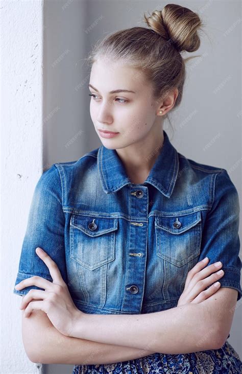 Free Photo Portrait Of A Blue Eyed Blond Female Dressed In A Denim Jacket