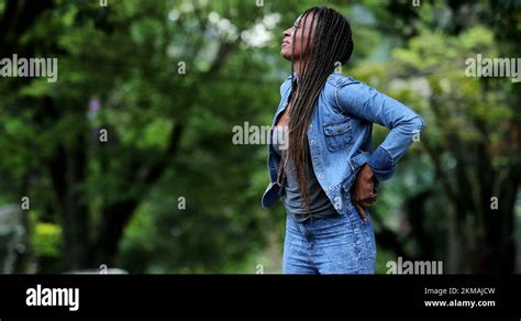 Woman Adjusting Pants And Jacket Girl Pulling Pants Up Stock Video Footage Alamy