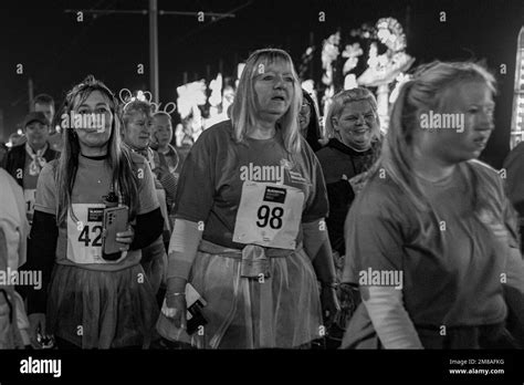 Women Walk Through The Illuminations For The Blackpool Memory Walk In Aid Of Trinity Hospice In