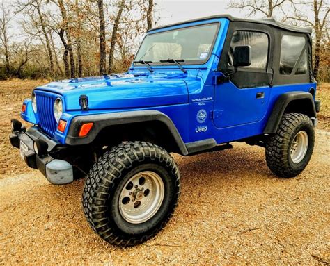 My 1999 Jeep Wrangler TJ In Amazing Shade Of Blue 120K Miles And Doesn