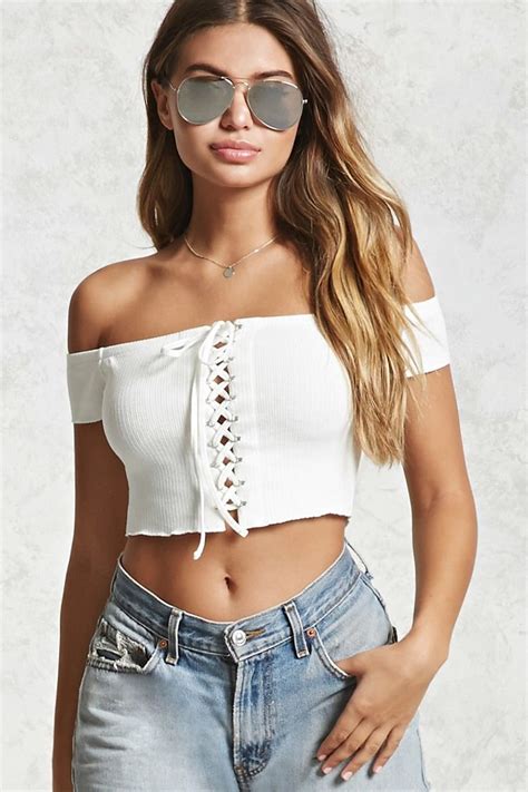 Forever 21 A Ribbed Knit Crop Top Featuring A Split Lace Up Front With Hardware Accents An