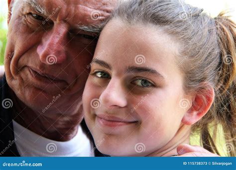 A Portrait Of A Granddaughter And Grandfather Stock Image Image Of Smiling Grandfather 115738373