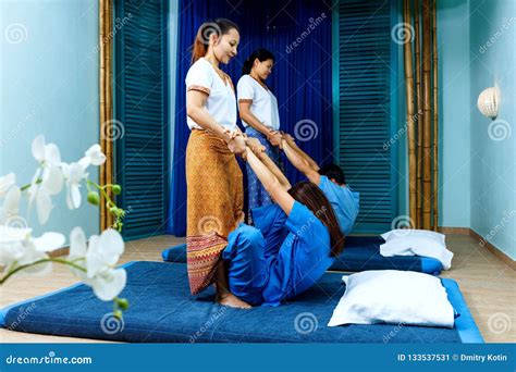 Two Thai Masseuses Synchronously Doing Thai Massage Stock Image Image Of Healthcare Couple