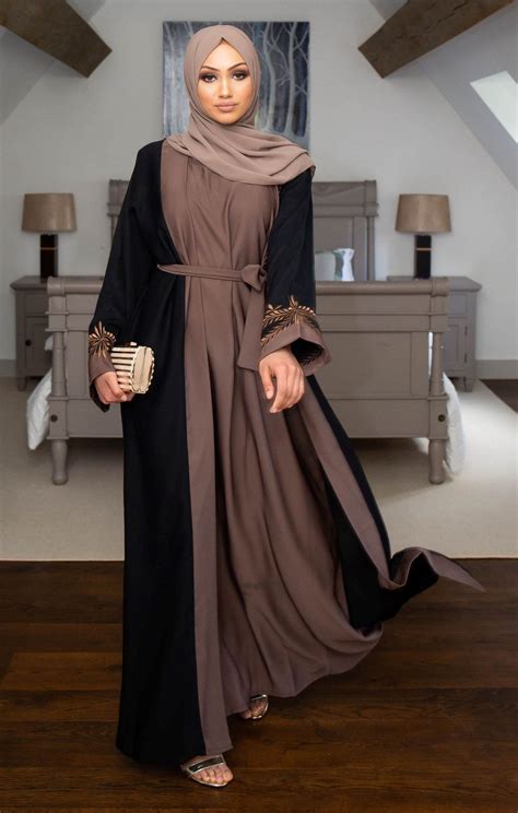 Buy Our Stunning Black Closed Abaya With Pretty Gold Pearllace Detailing Throughout The Abaya