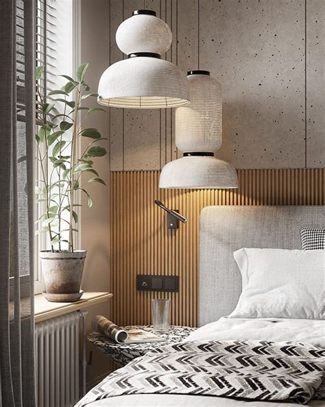 Three Lamps Hanging From The Ceiling Above A Bed In A Room With Wood
