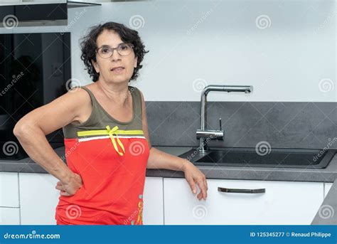 Beautiful Mature Woman In The Kitchen Stock Image Image Of Cheerful Senior 125345277