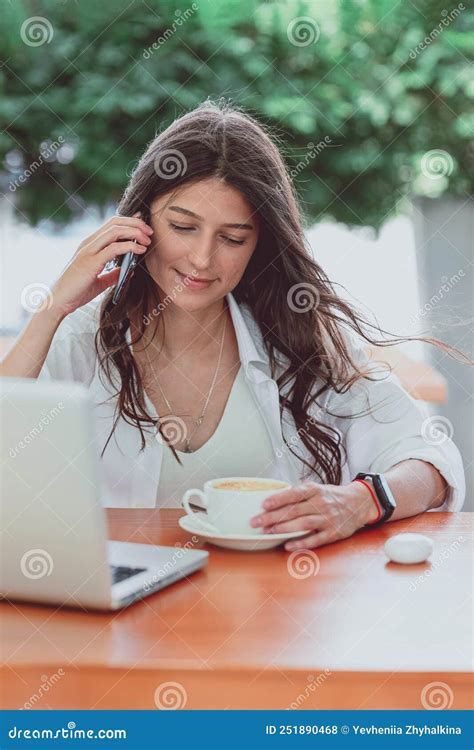 Portrait Of Happy Young Office Assistant Working Remotely Online Sitting With Laptop Stock