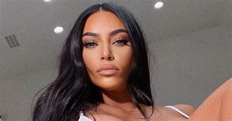 Kim Kardashian Flaunts Killer Cleavage In Plunging Vest For Red Hot