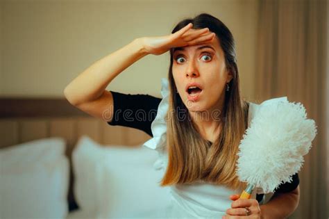 Funny Surprised Maid Holding A Duster Looking Puzzled Stock Image Image Of Holding Look