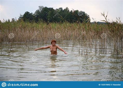 Beautiful Nude Woman Bathing In The Lake Stock Photo Image Of Marina