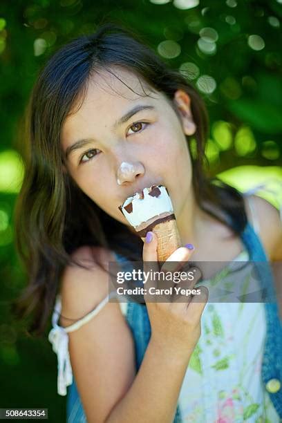 Girls Licking Ice Cream Photos And Premium High Res Pictures Getty Images