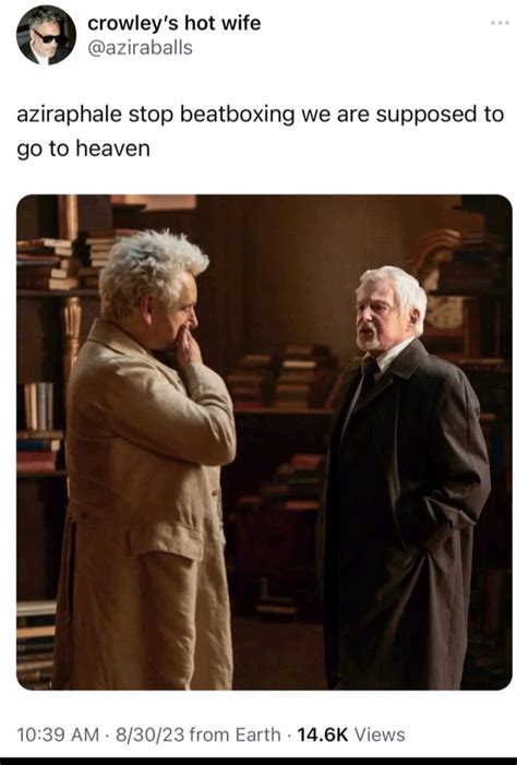 Two Men Standing Next To Each Other Talking