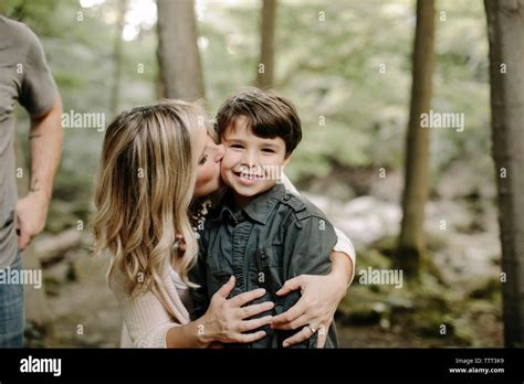 Father Kissing Son Mother Hi Res Stock Photography And Images Alamy