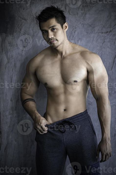 Portrait Of Asian Man Big Muscle At The Gymthailand Peopleworkout For Good Healthybody Weight