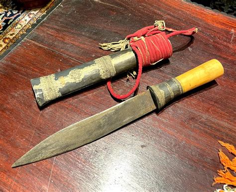 Sold At Auction A Burmese Dha Tribal Knife With Ivory Handle