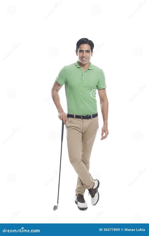 Male Golfer Standing With A Golf Club And Smiling Stock Image Image