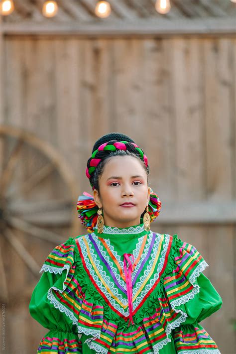 Portrait Girl Dressed Up With A Traditional Mexican Dress And Braid Hairstyle By Stocksy
