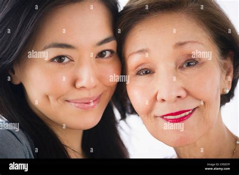 Smiling Japanese Mother And Daughter Stock Photo Alamy