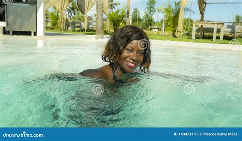 Happy And Beautiful Black African American Woman In Bikini Having Fun At Tropical Beach Resort