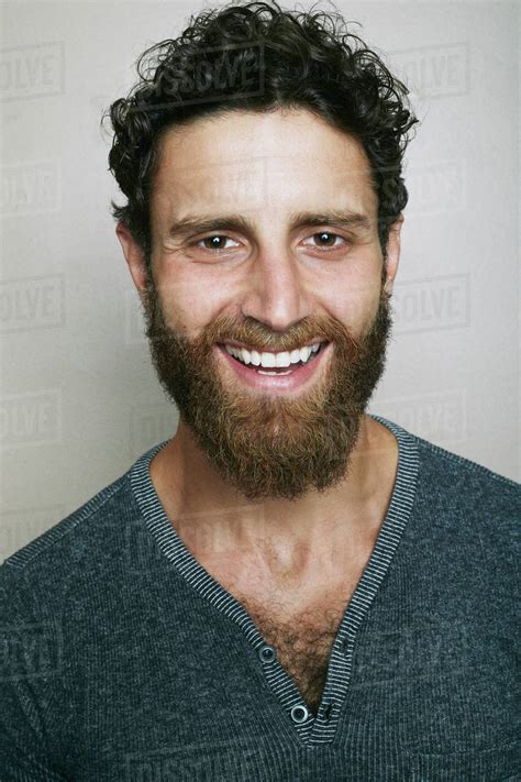 Smiling Caucasian Man With Beard Looking At Camera Stock Photo Dissolve