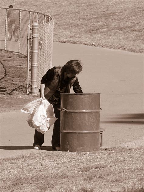 Homeless Woman Searching For Cans And Bottles Homeless Wom Flickr