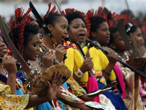Thousands Of Topless Virgins Defy Criticism And Parade With Machetes