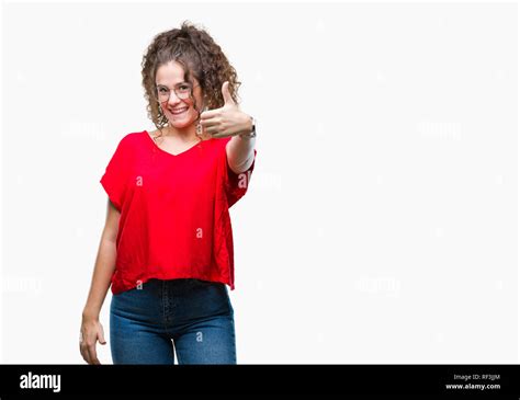 Beautiful Brunette Curly Hair Young Girl Wearing Glasses Over Isolated Background Doing Happy