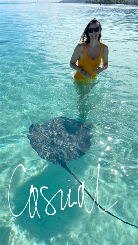 Maria Sharapova In Yellow Swimsuit Swims With Stingrays 12thBlog