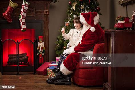 Sits On Santas Lap Photos And Premium High Res Pictures Getty Images