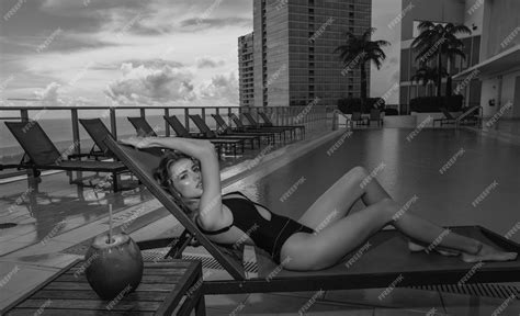 Premium Photo Sexy Woman On Sunbed Swimming Pool And Sexy Woman Swimsuit Swimwear Model Woman