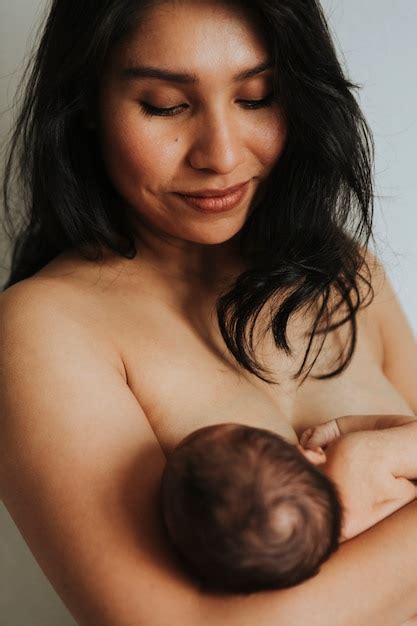 Premium Photo Naked Mother Holding Her Newborn Baby