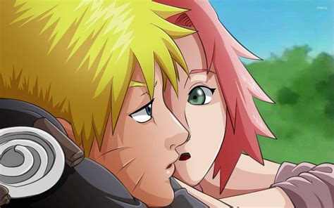 Download Sakura Looking At Naruto Wallpaper