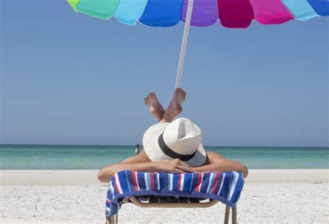 Sun Bathing At Beach The Luxury Expert
