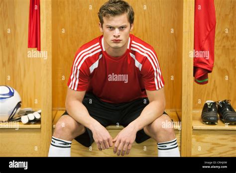 Soccer Player Sitting In Locker Room Stock Photo Alamy