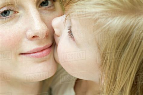 An Affectionate Mother And Daughter Close Up Stock Photo Dissolve
